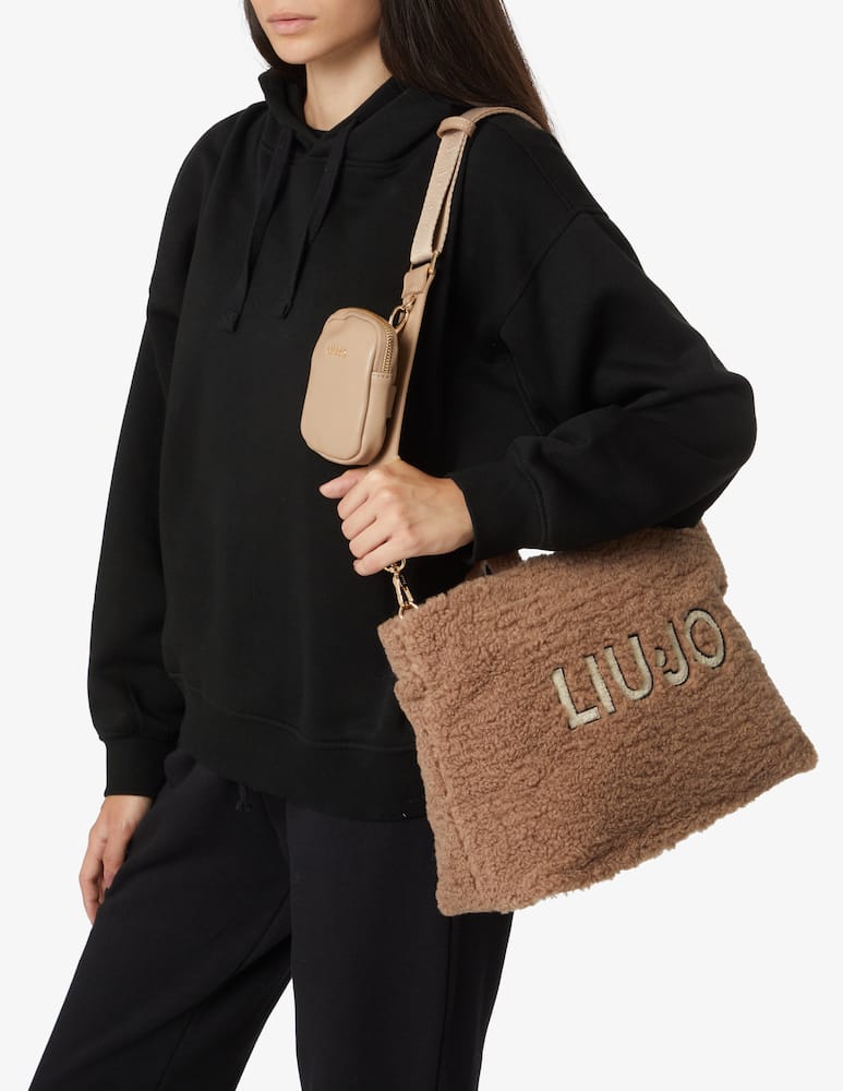 Shop Liu Jo Acha medium teddy tote bag- Marrone - Brown on Rinascente