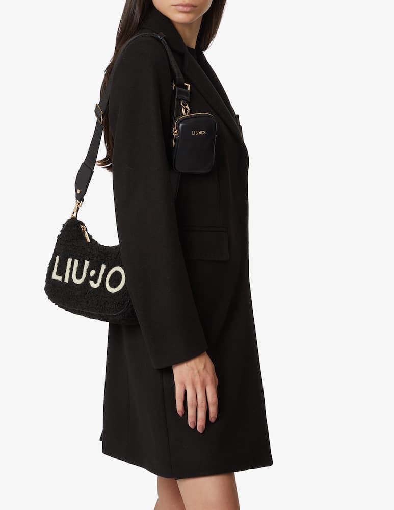 Shop Liu Jo Acha mini hobo teddy crossbody bag- Nero - Black on Rinascente