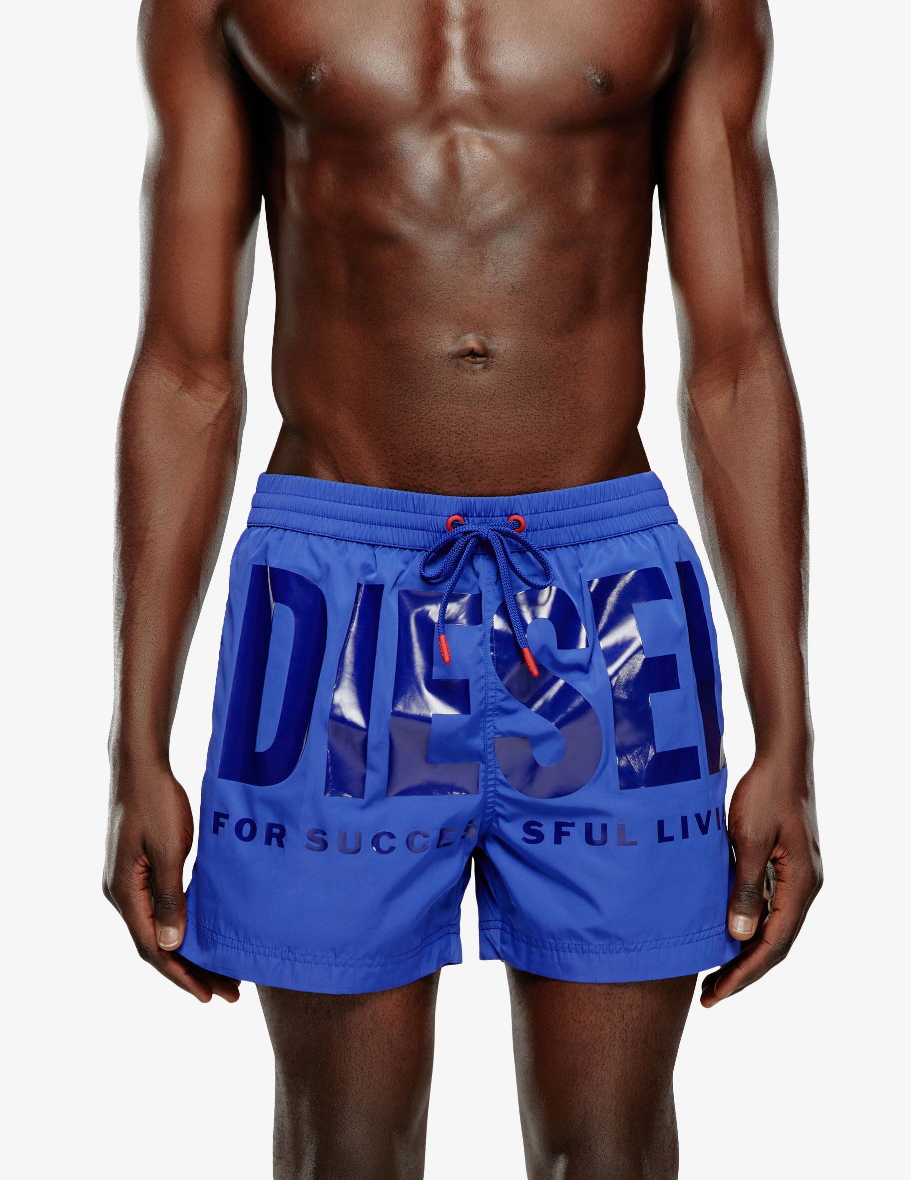 Shop Diesel Swim Trunks logo rubber on Rinascente