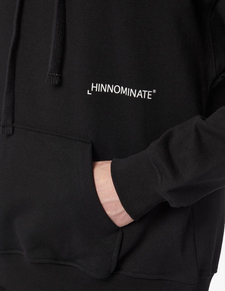 Shop HINNOMINATE Chest logo hoodie - black on Rinascente